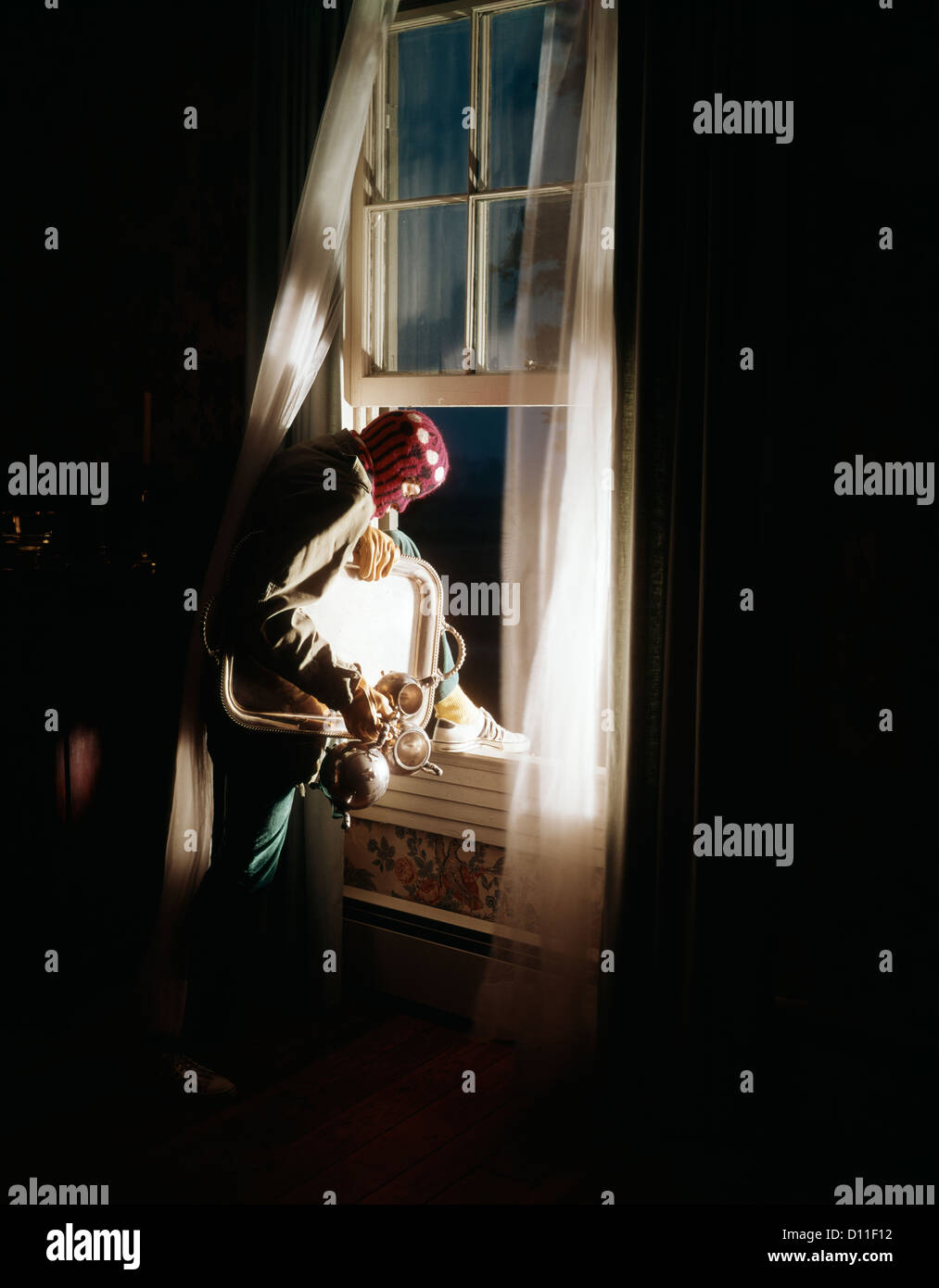 1960s ROBBER STEALING SILVER TEA SERVICE WEARING SKI MASK GOING OUT ...