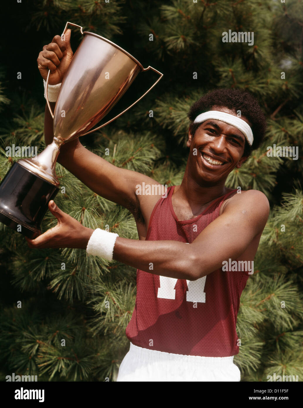 African man winner trophies hi-res stock photography and images - Alamy