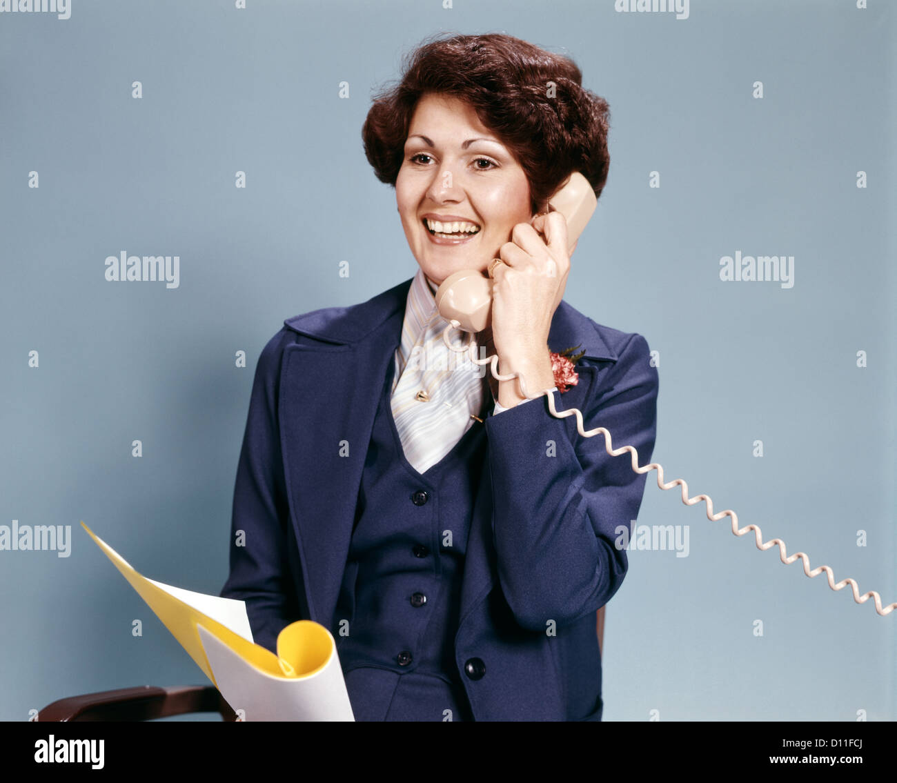 1970s SMILING BUSINESS WOMAN TALKING ON TELEPHONE RETRO Stock Photo - Alamy