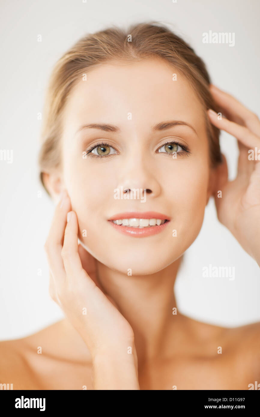 face and hands of beautiful woman Stock Photo - Alamy