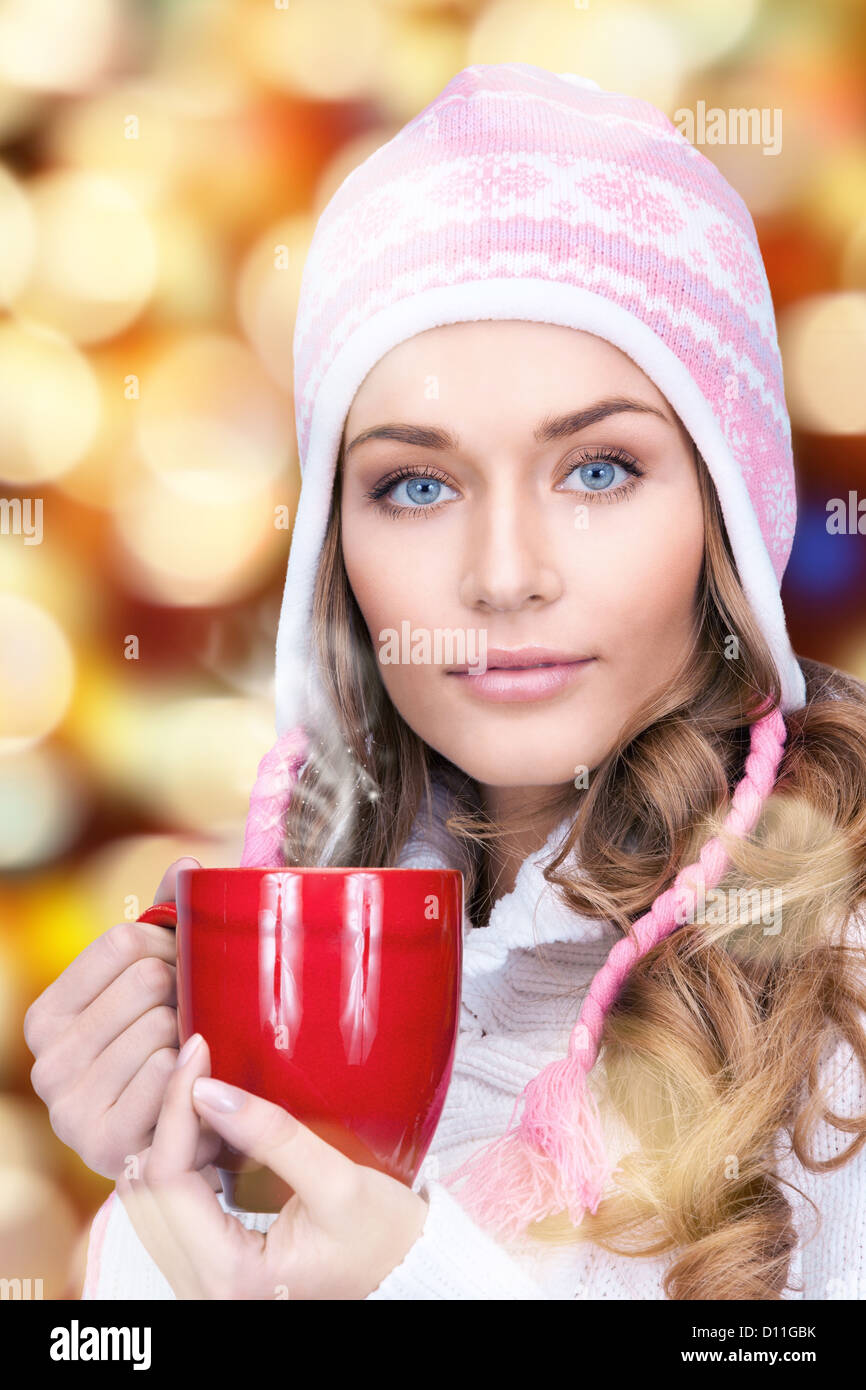 beautiful woman with red mug Stock Photo - Alamy