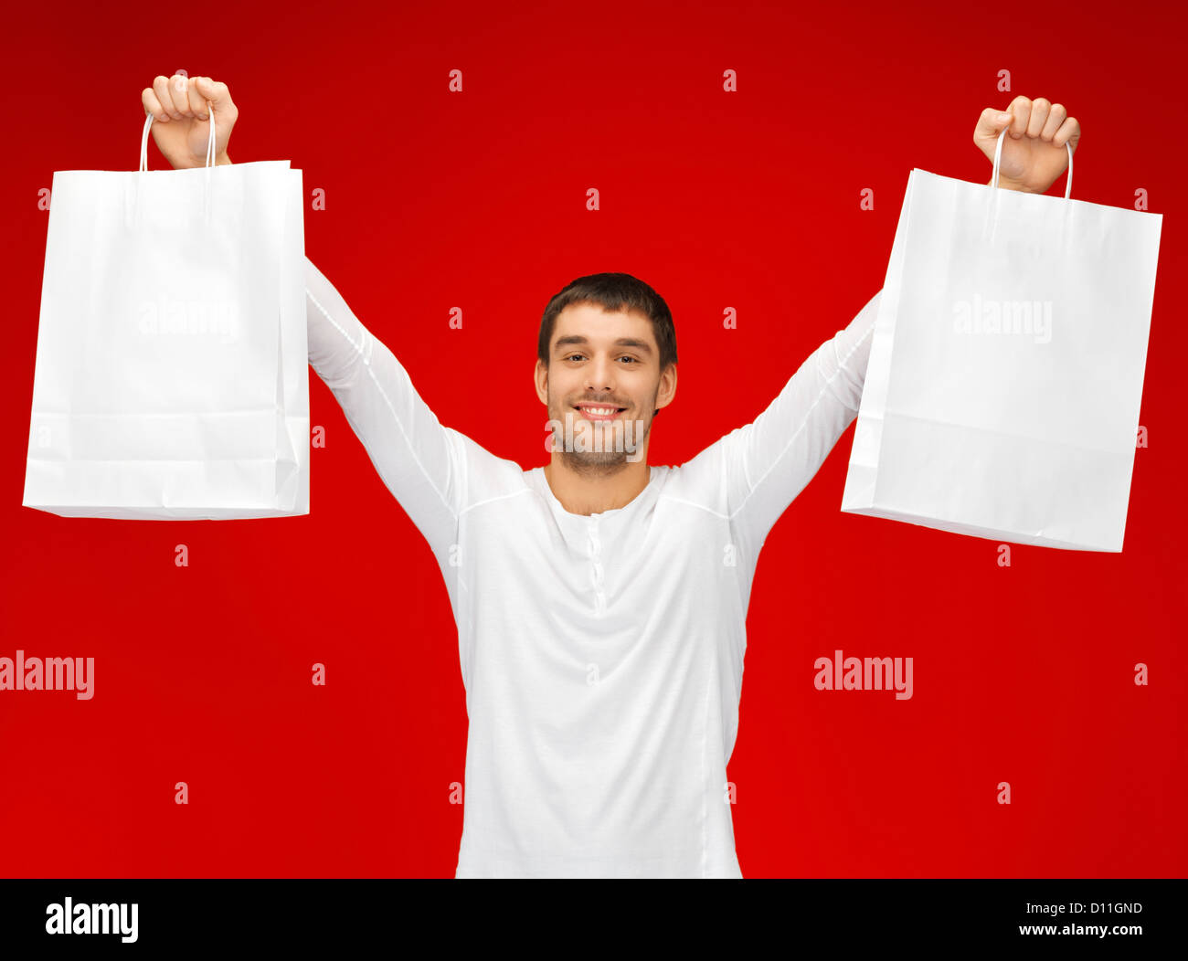 man with shopping bags Stock Photo - Alamy