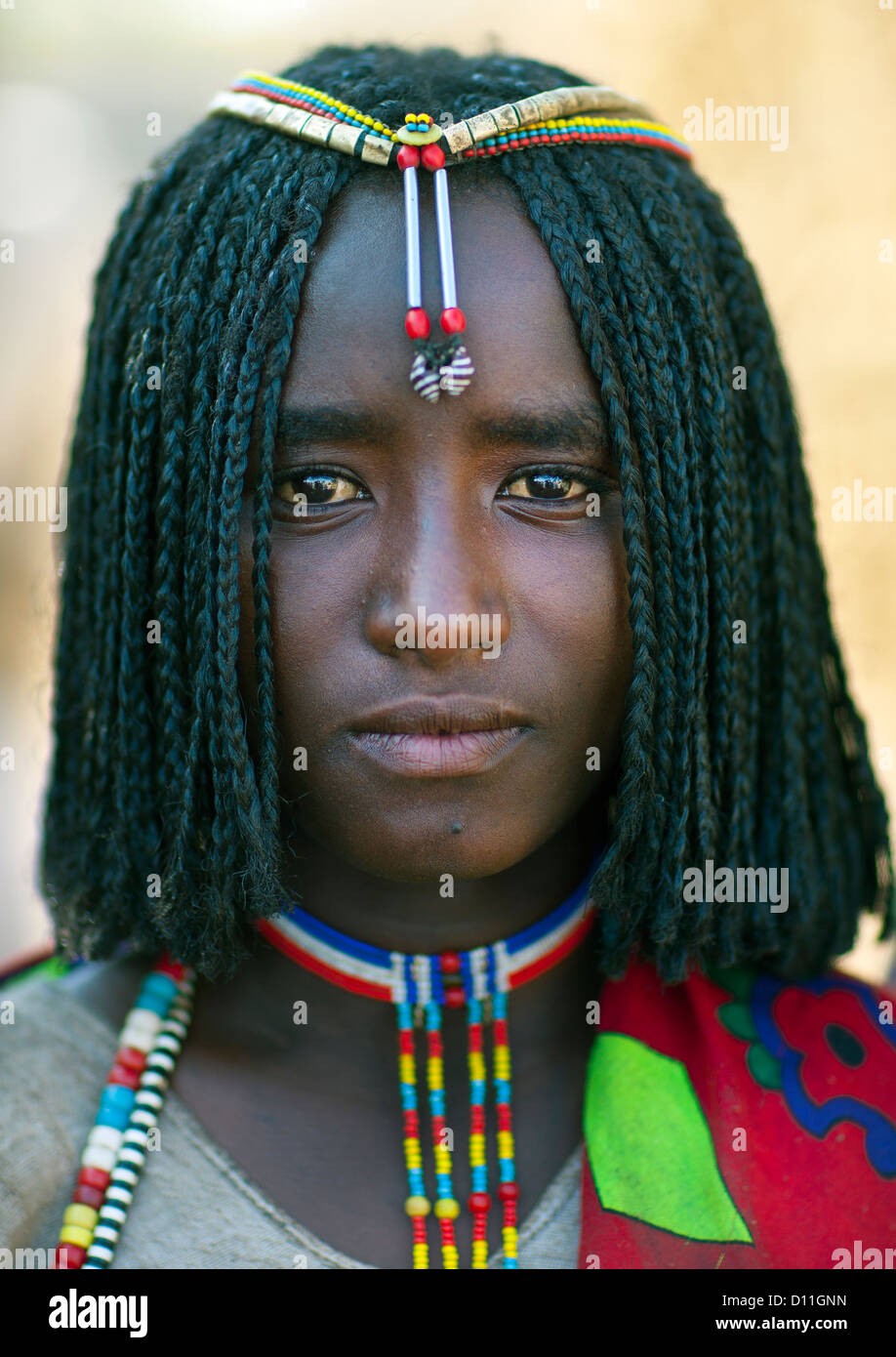 Portrait Of A Shy Karrayyu Tribe Girl With Stranded Hair And Colourful ...