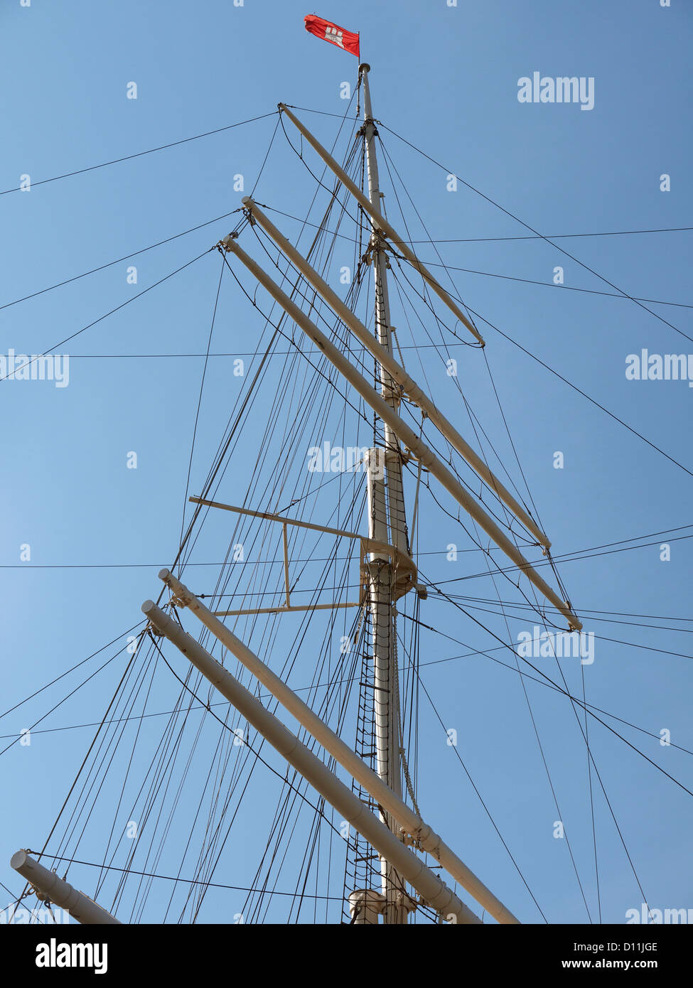 Germany, Hamburg, Rigging on old sailing ship with flag Stock Photo - Alamy