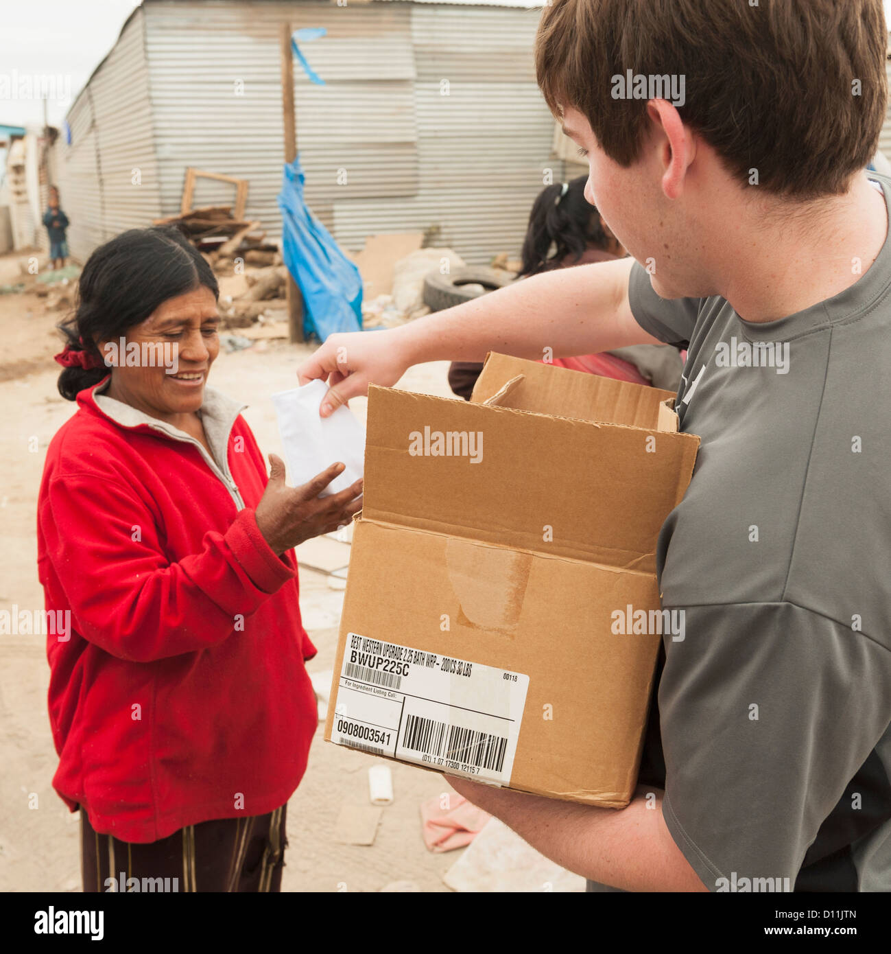 Man giving donation boxes hi-res stock photography and images - Alamy