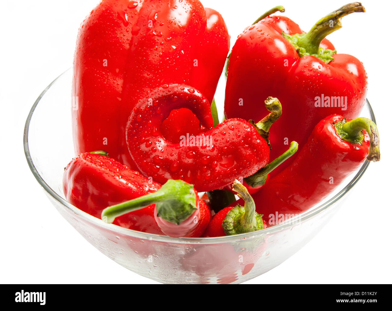 Glass dish full of red and green pepper close view Stock Photo - Alamy