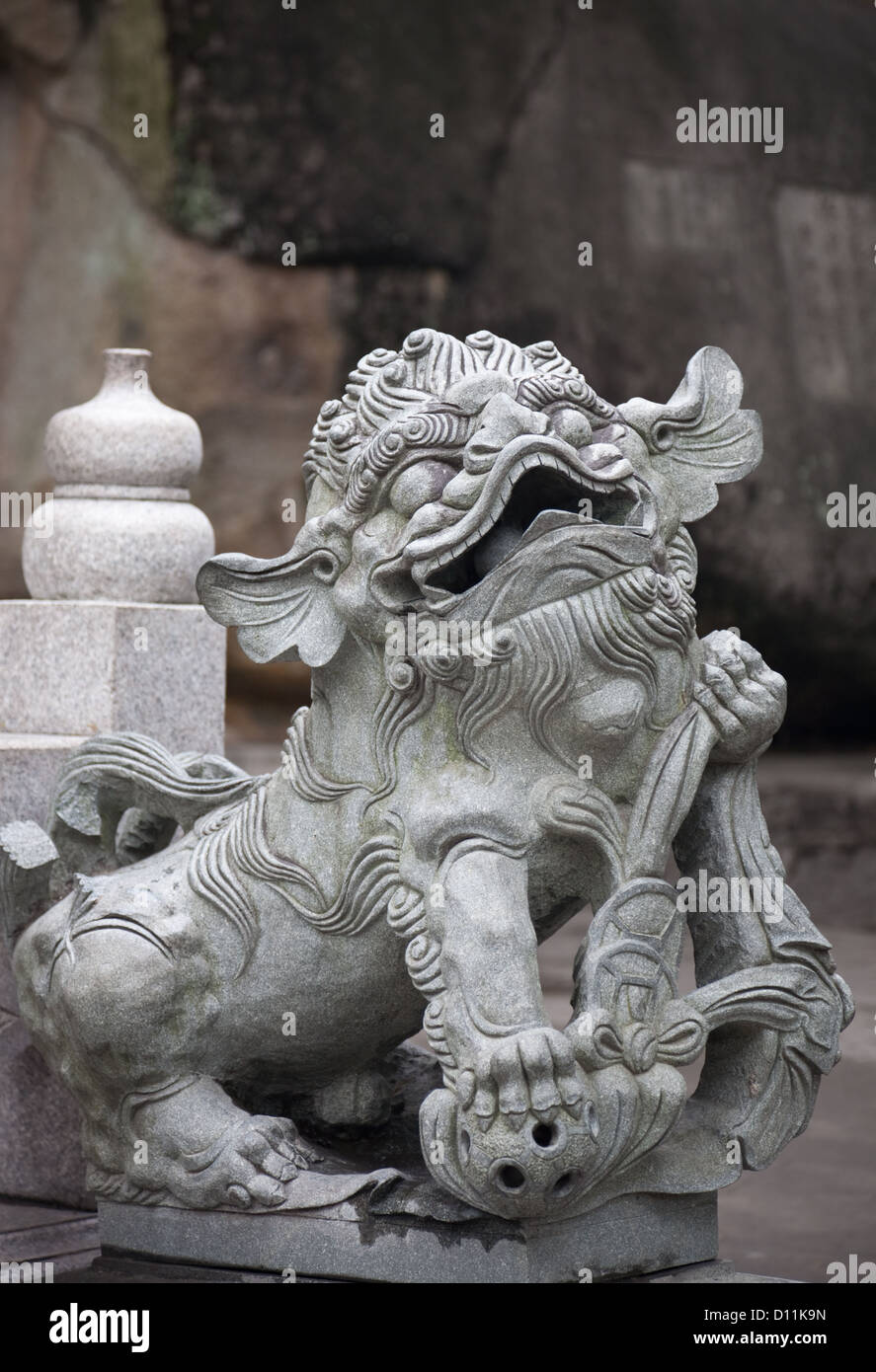 Chinese stone lion Stock Photo - Alamy