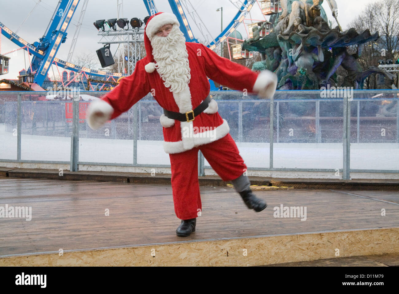 Berlin Germany EU November Santa Claus posing in front of ice rink at ...