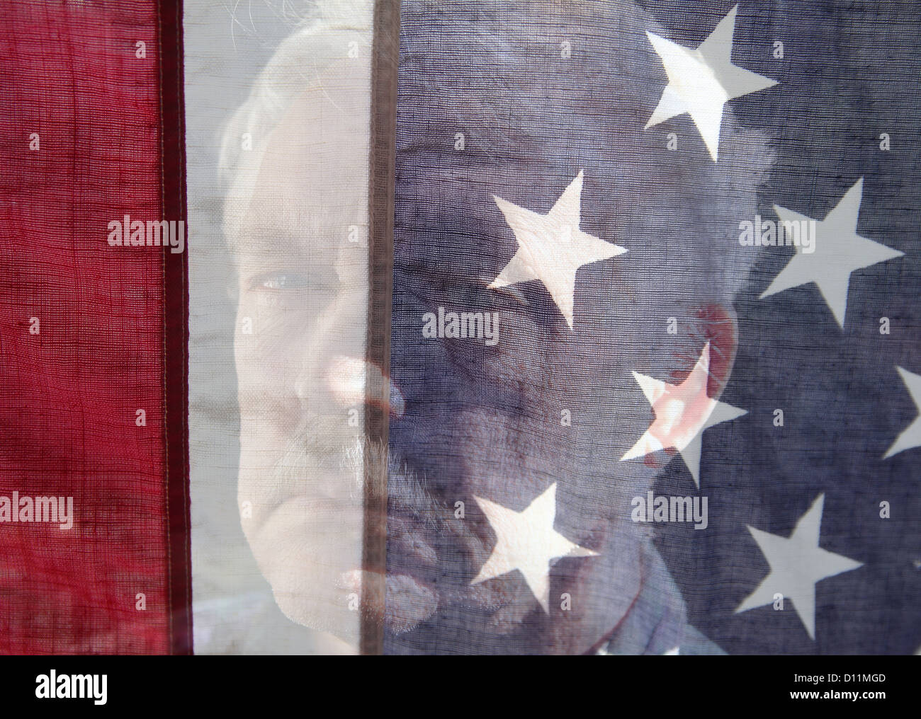 an older man is seen behind an American flag Stock Photo - Alamy