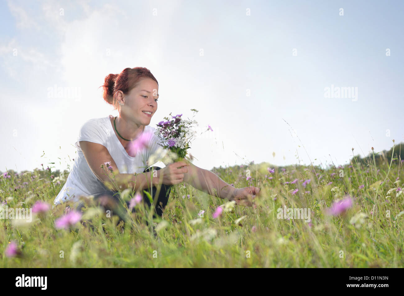 Girl picking flowers in spring hi-res stock photography and images - Alamy