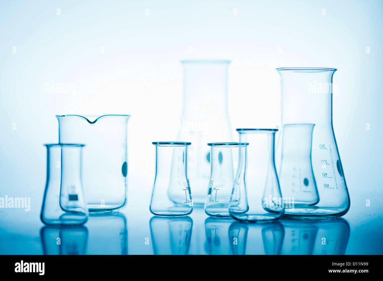 Volumetric flasks against white background, close up Stock Photo - Alamy