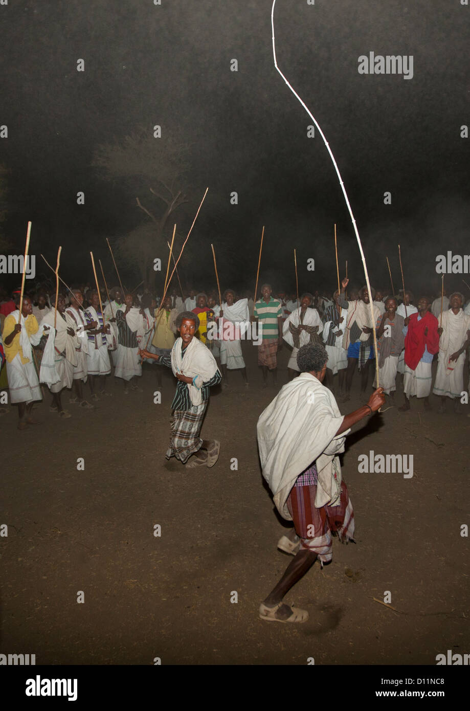 Night Shot Of Two Karrayyu Tribe Men During A Choreographed Stick Dance ...