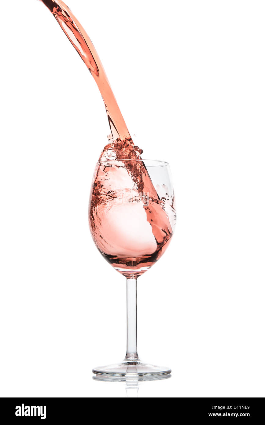 rose wine splashing on white background Stock Photo - Alamy