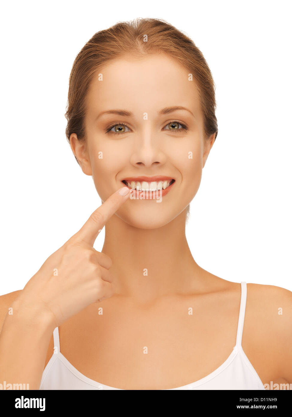 beautiful woman pointing to teeth Stock Photo - Alamy