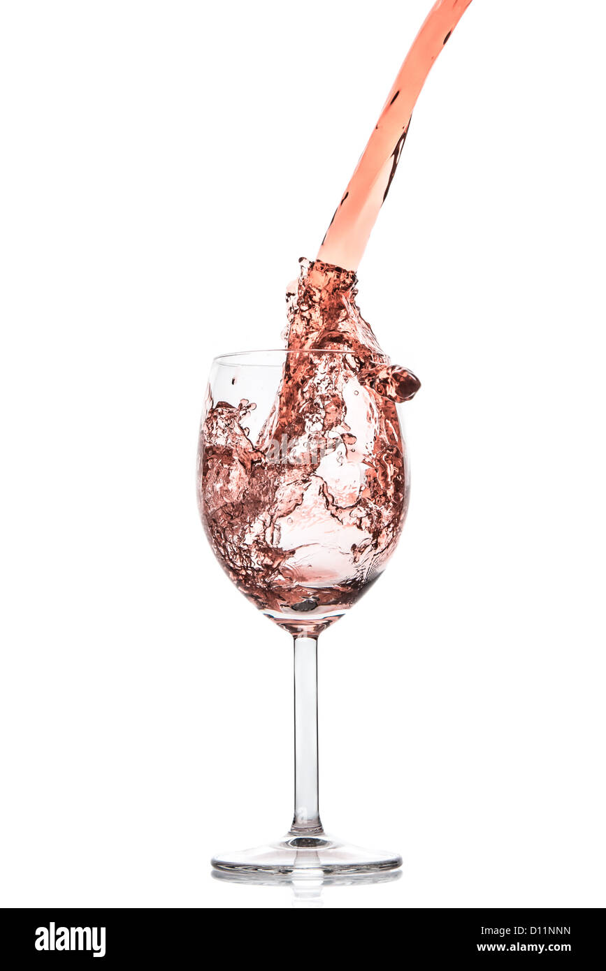 rose wine splashing on white background Stock Photo - Alamy