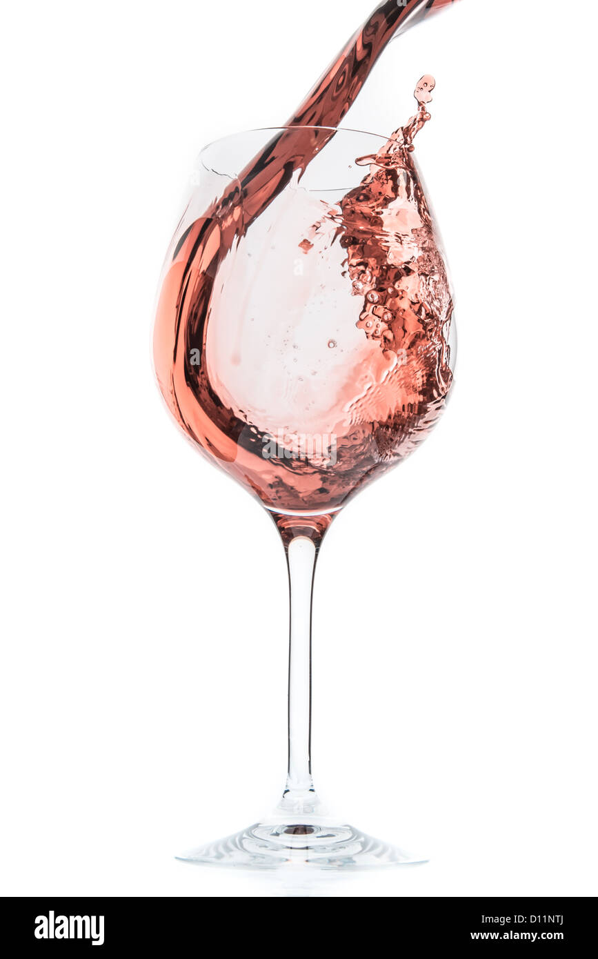 rose wine splashing on white background Stock Photo - Alamy