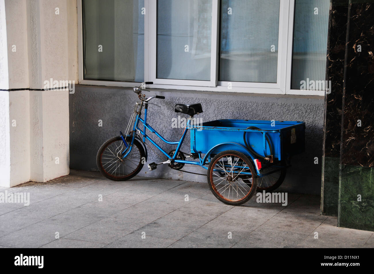 Blue Tricycle With Container On The Back; Beijing China Stock Photo - Alamy