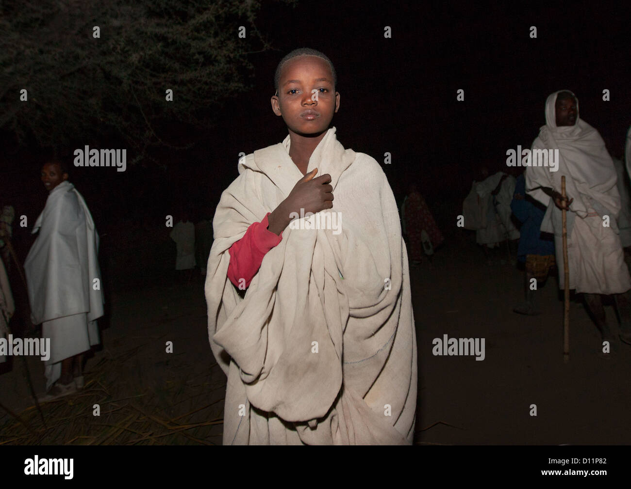 Night Shot Of A Young Karrayyu Tribe Boy Standing Proud Among Other ...