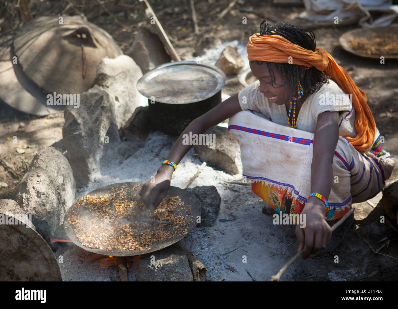 Karrayyu Tribe Woman Squatting To Cook During Gadaaa Ceremony, Metahara ...