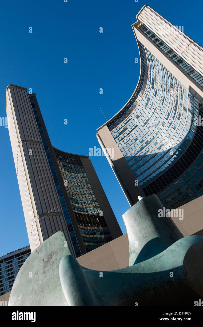 Low Angle View Of Two Curved Buildings Against A Blue Sky; Toronto ...