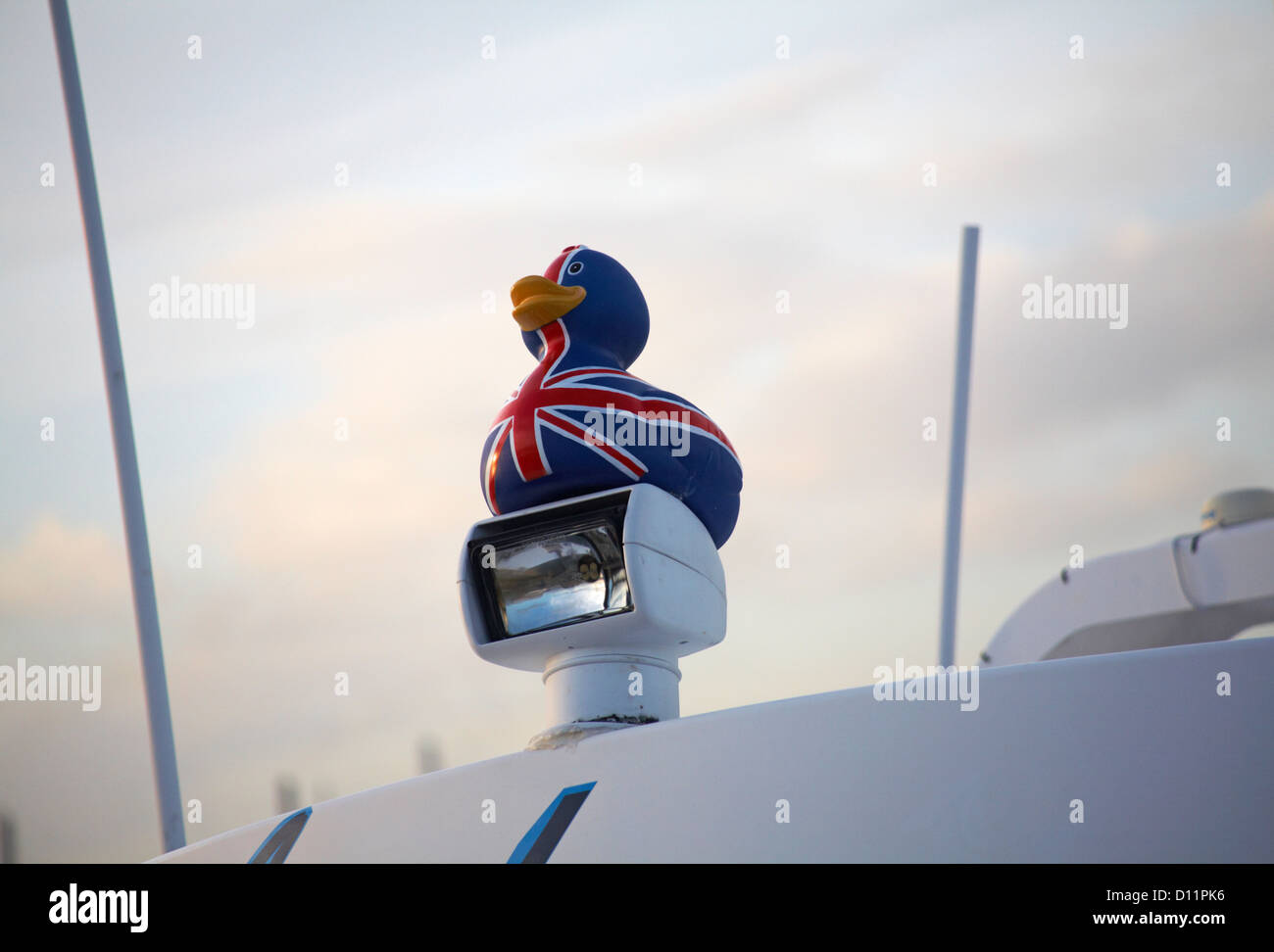 Union Jack rubber duck sitting on top of light on boat at Calshot ...