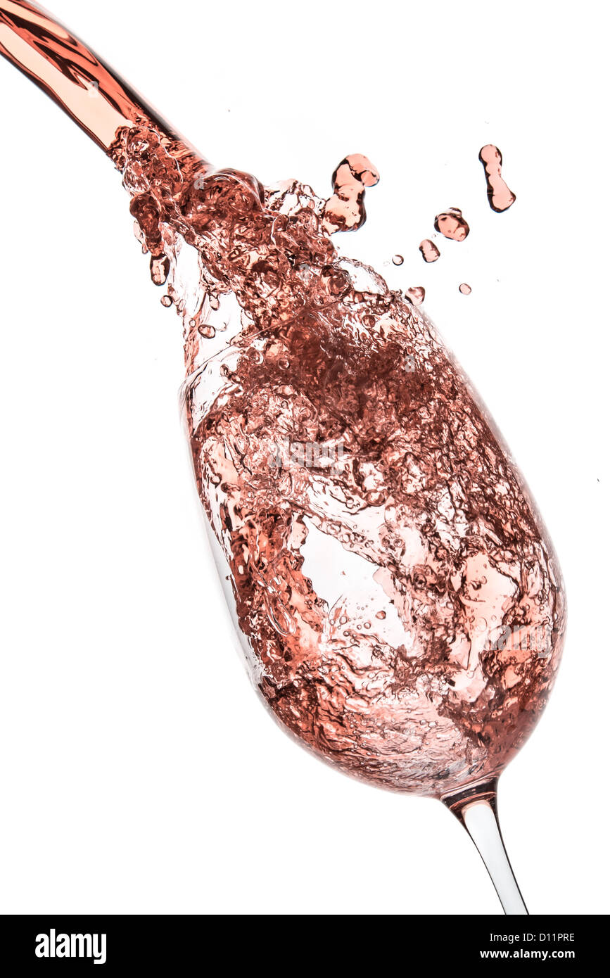 rose wine splashing on white background Stock Photo - Alamy