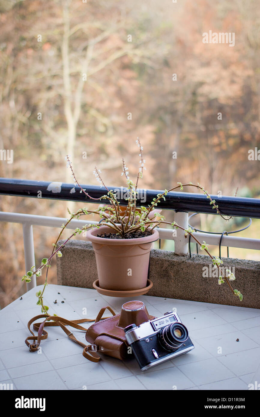 Vintage soviet analog camera (fed-5v) with a brown leather case, put on ...