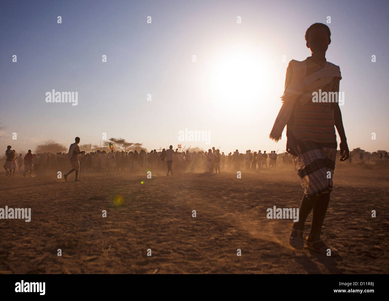 Karrayyu Tribe Kid And Group Of Karrayyu People At Sunset During Gadaaa ...