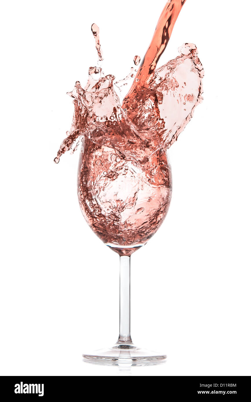 rose wine splashing on white background Stock Photo - Alamy