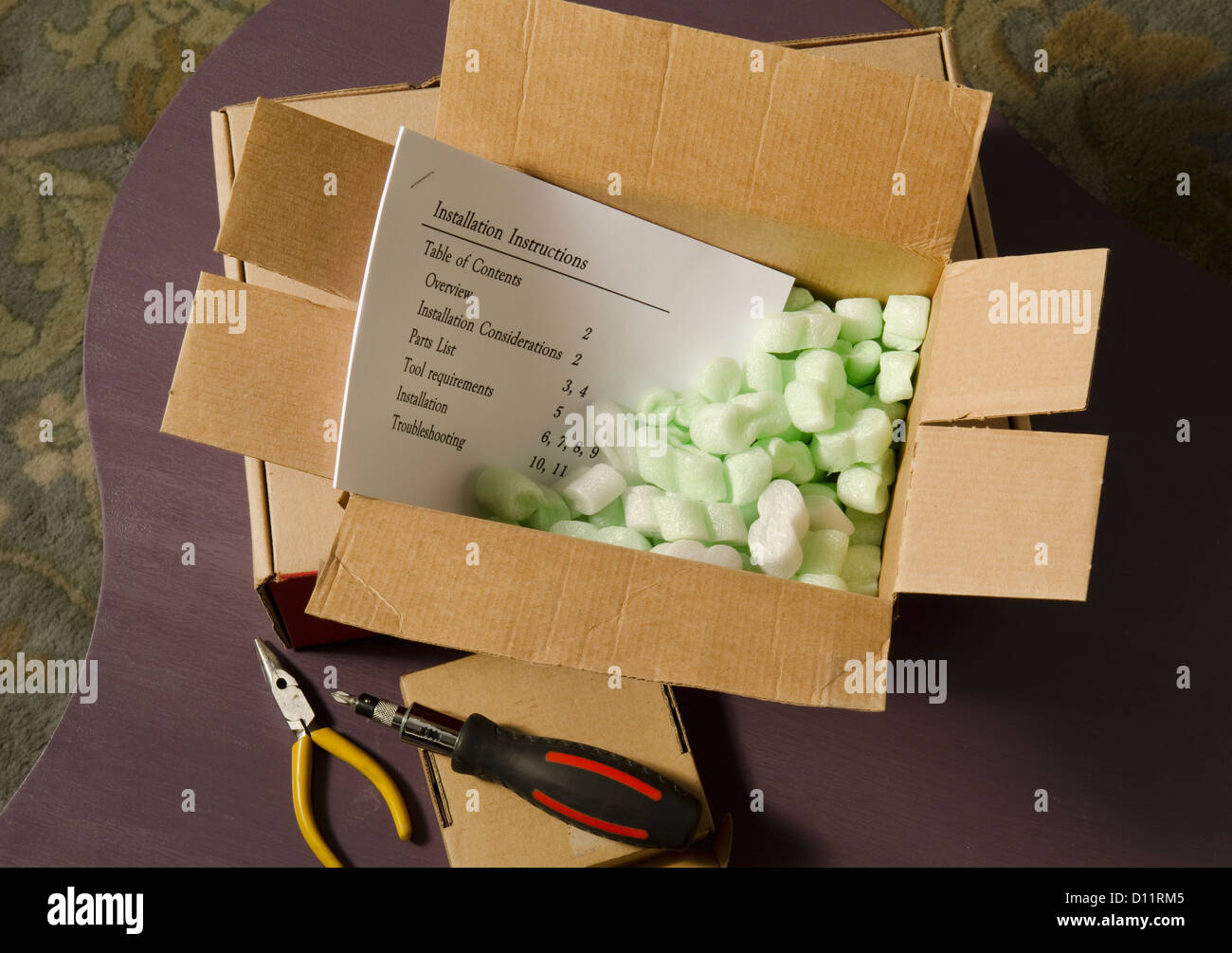 open boxes with installation booklet Stock Photo - Alamy