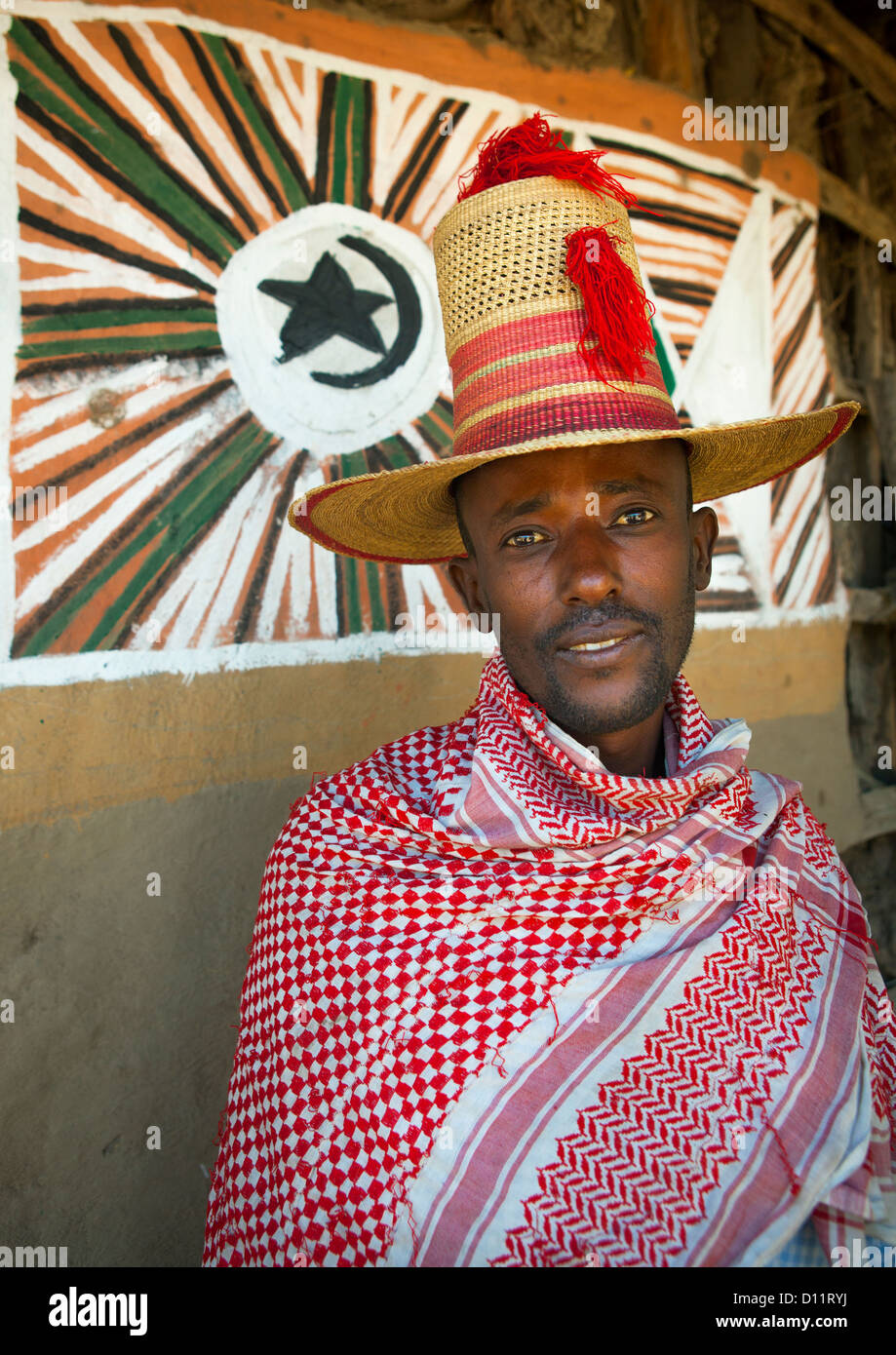 Portrait Of A Muslim Man With Tall Hat Inside His Tukul, Alaba ...