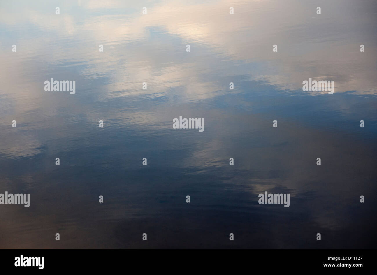 Cloud reflection in water Stock Photo - Alamy