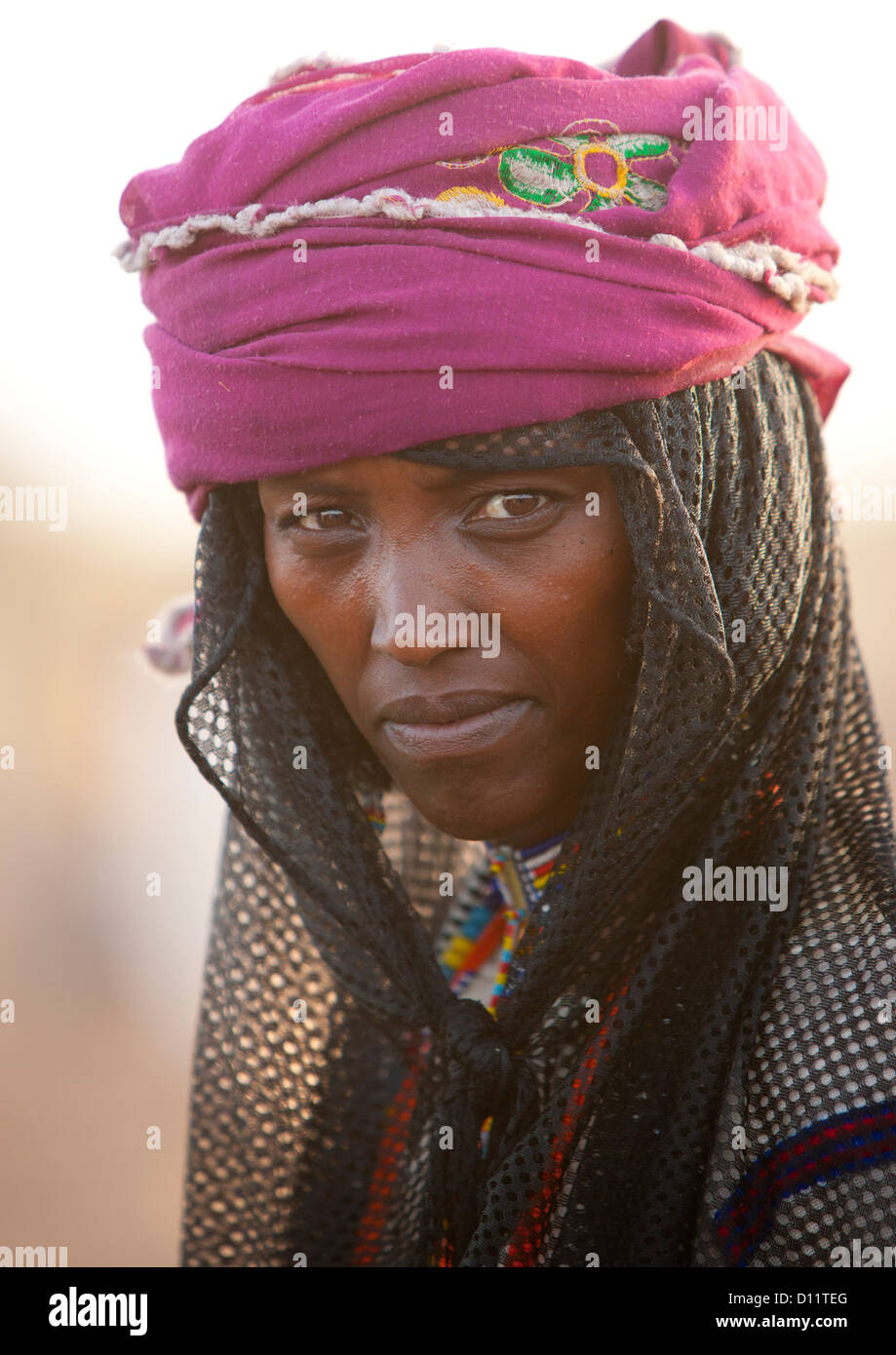 Portrait Of A Karrayyu Tribe Woman With Colourful Necklaces And Black ...