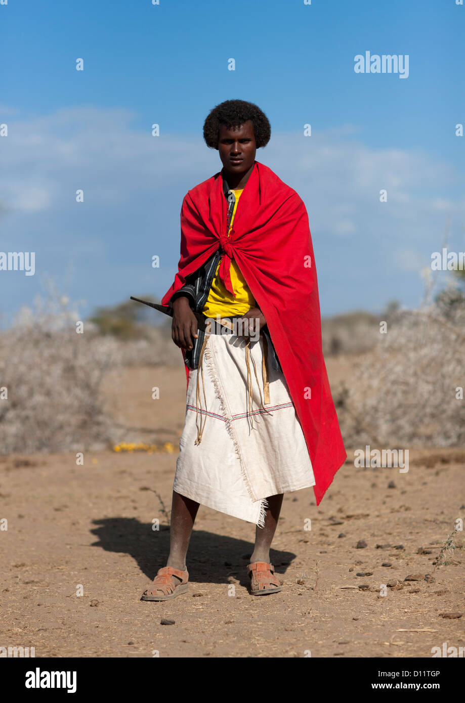 Portrait Of A Karrayyu Tribe Man In Red Clothes With Traditional ...
