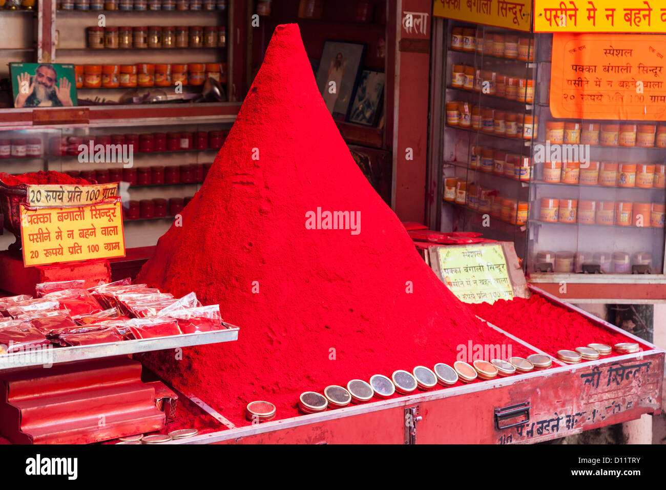 India, Uttarakhand, Haridwar, Red tika powder at market stall Stock ...