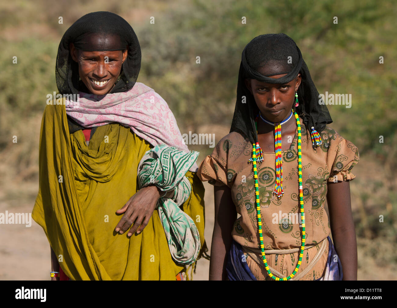 Portrait Of Smiling Oromo Tribe Women With Black Headscarf And ...