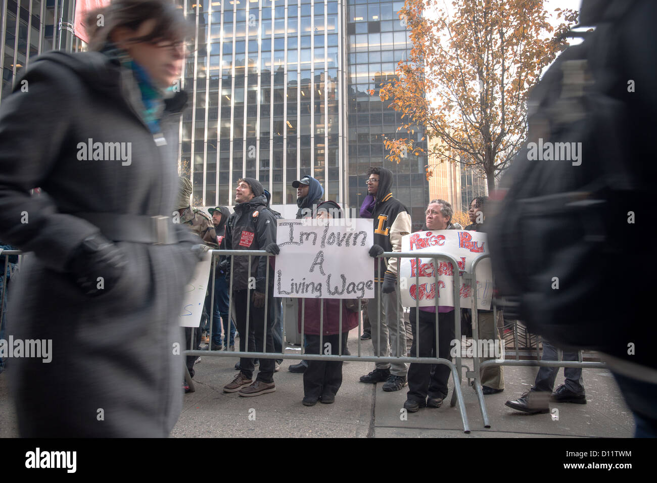 Workers at fast food restaurants engage in a one-day strike for a ...