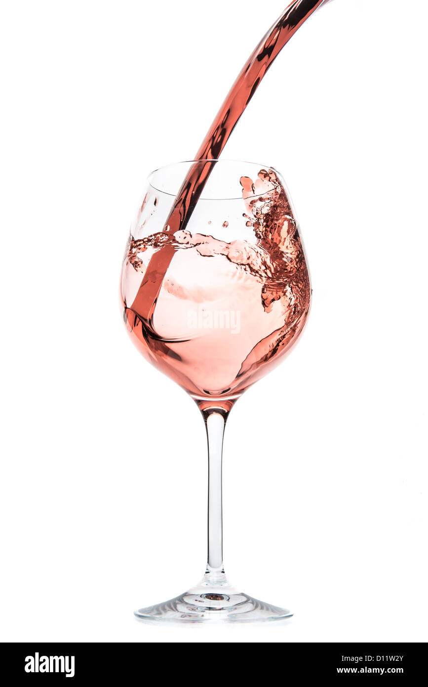 rose wine splashing on white background Stock Photo - Alamy