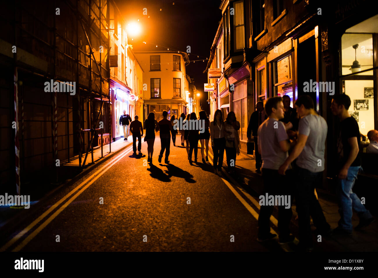 Groups of Young people out partying on a Saturday night on the streets ...