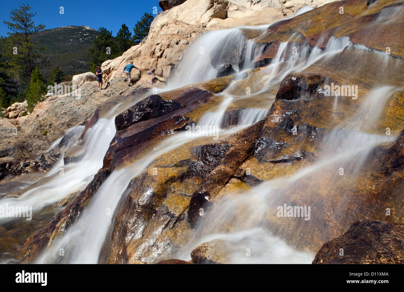 Kids rock climbing at the Alluvial Fan Waterfall Stock Photo - Alamy