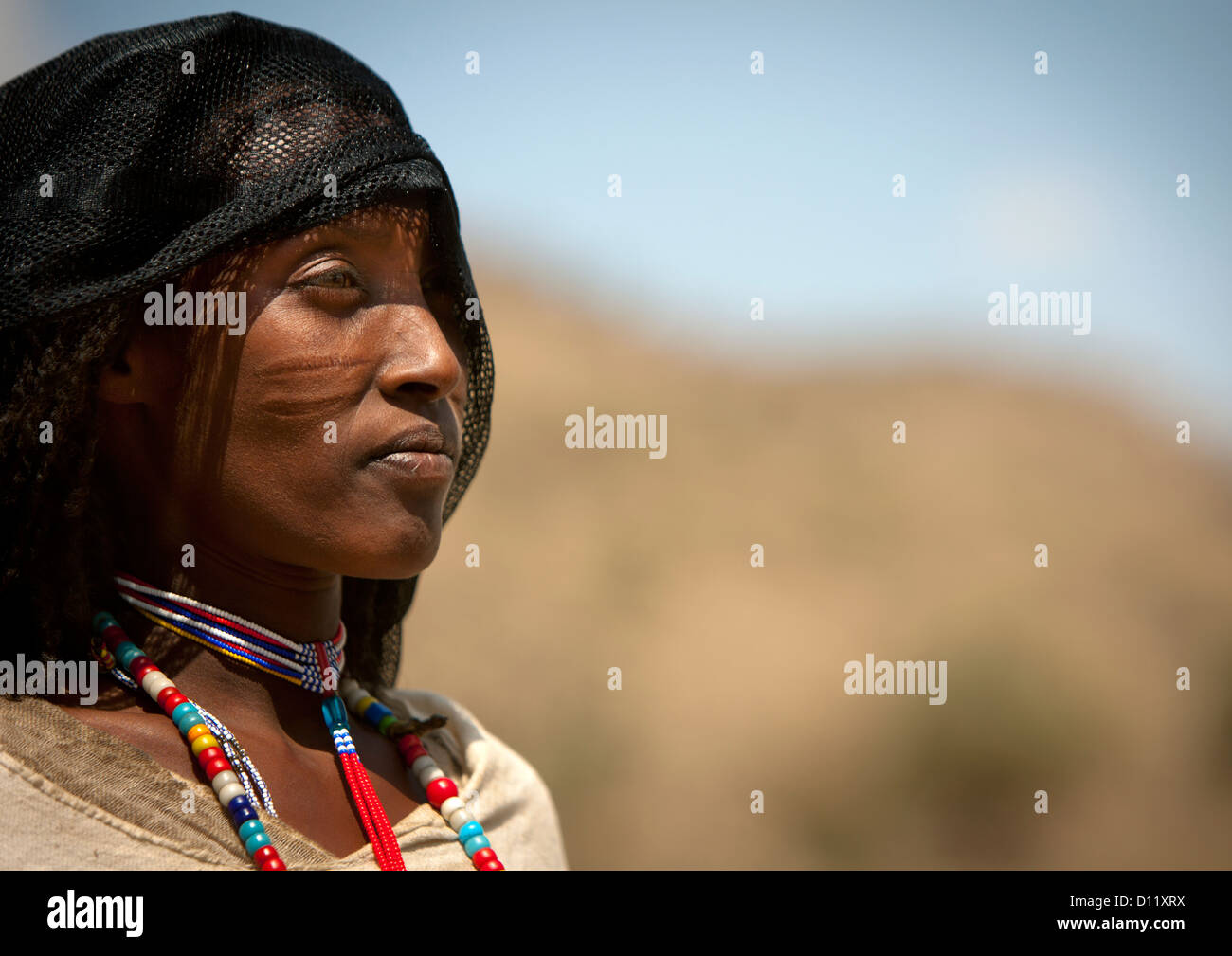 Profile Portrait Of A Smiling Karrayyu Tribe Woman With Facial ...