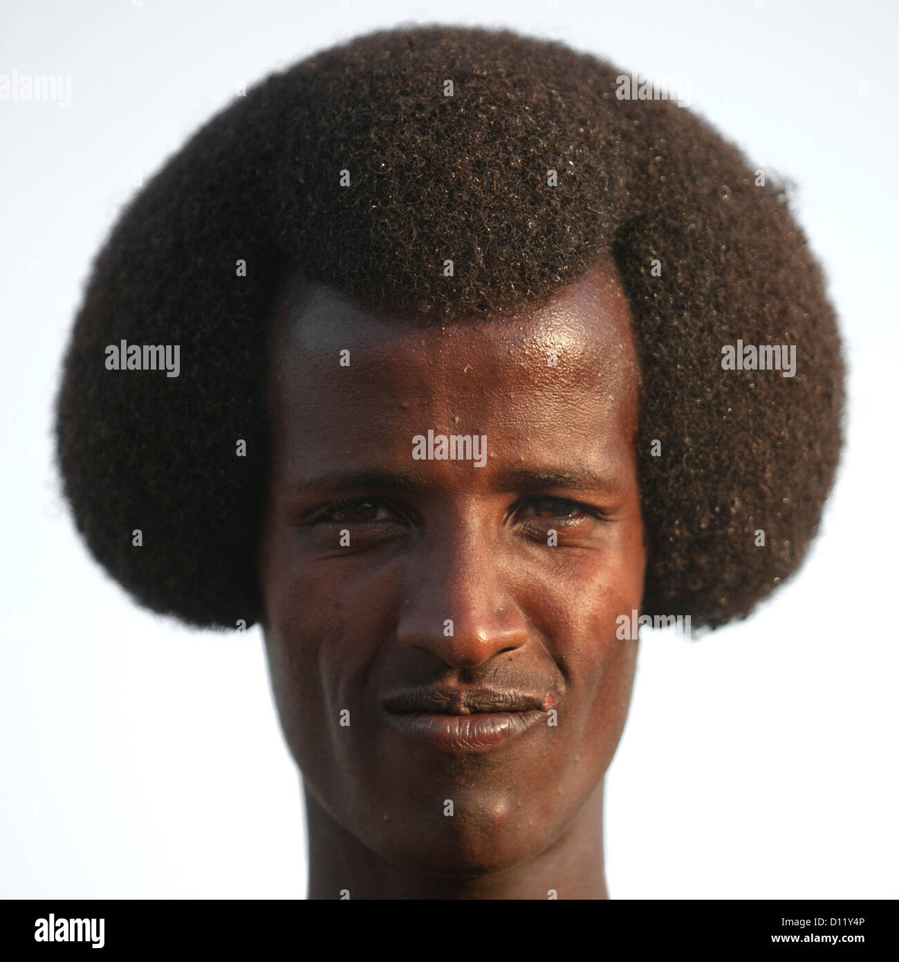 Portrait Of A Young And Smiling Karrayyu Tribe Warrior With Gunfura ...
