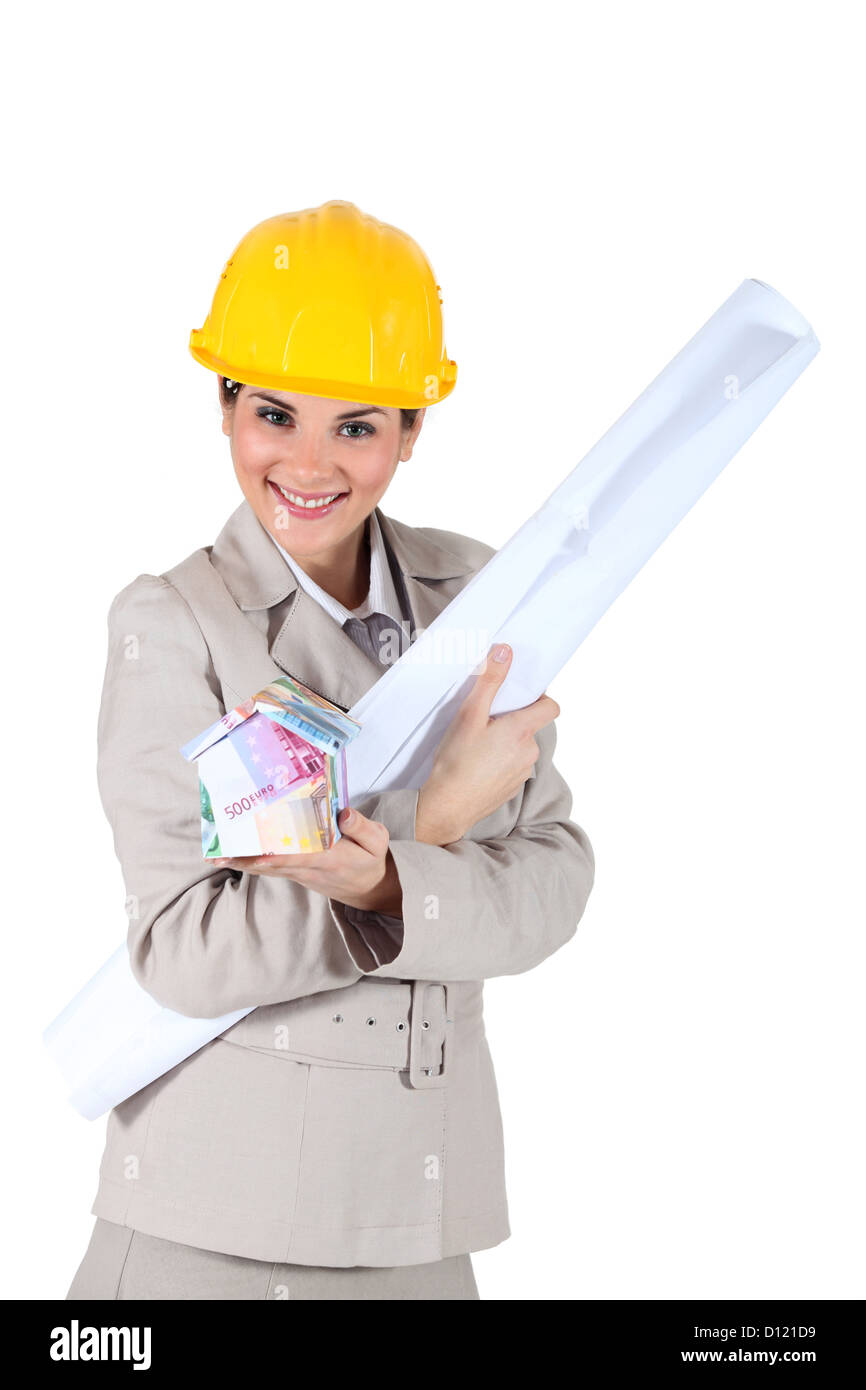 Architect hugging blueprints Stock Photo - Alamy