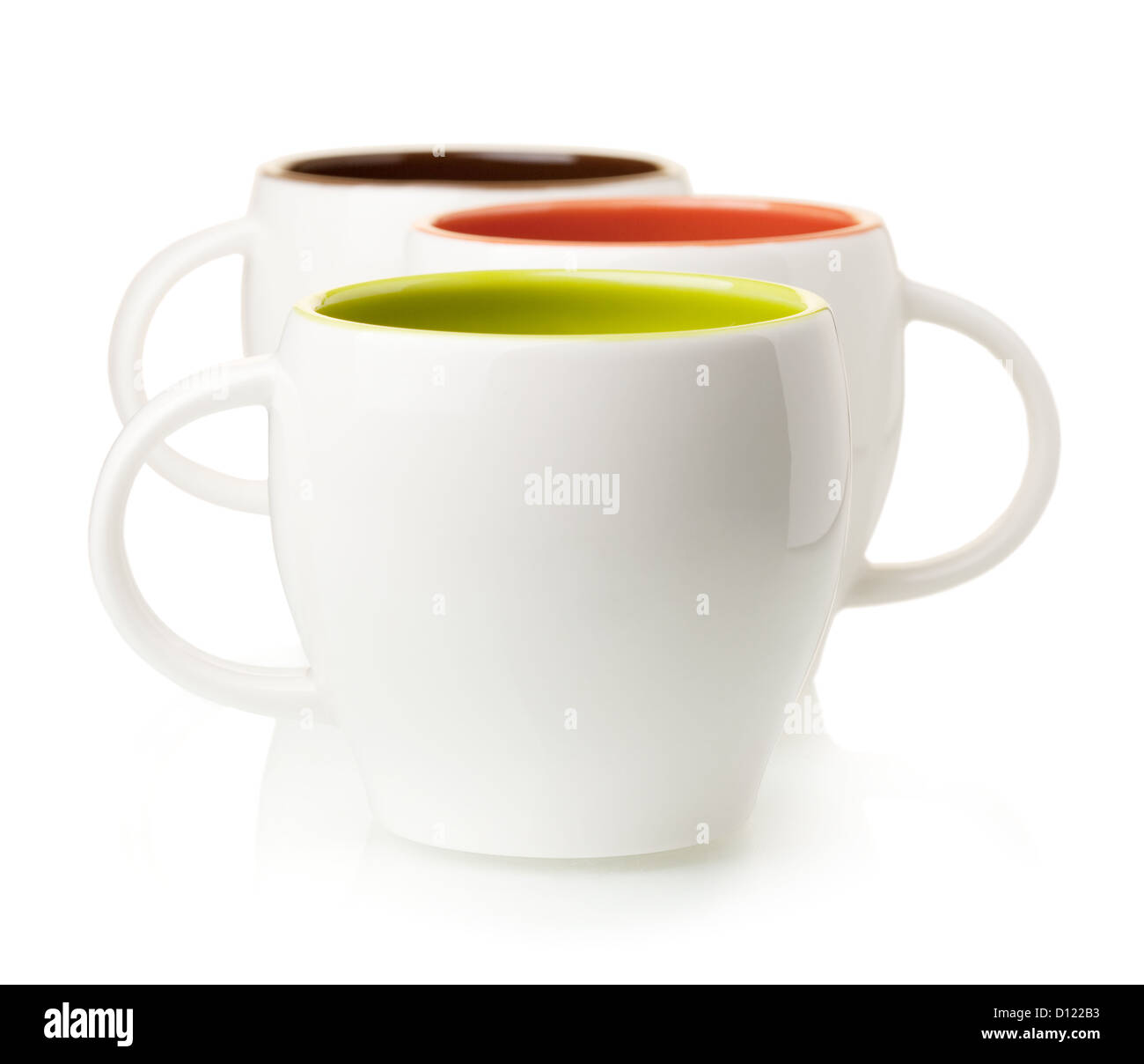 Three color coffee cups, isolated on white background Stock Photo - Alamy
