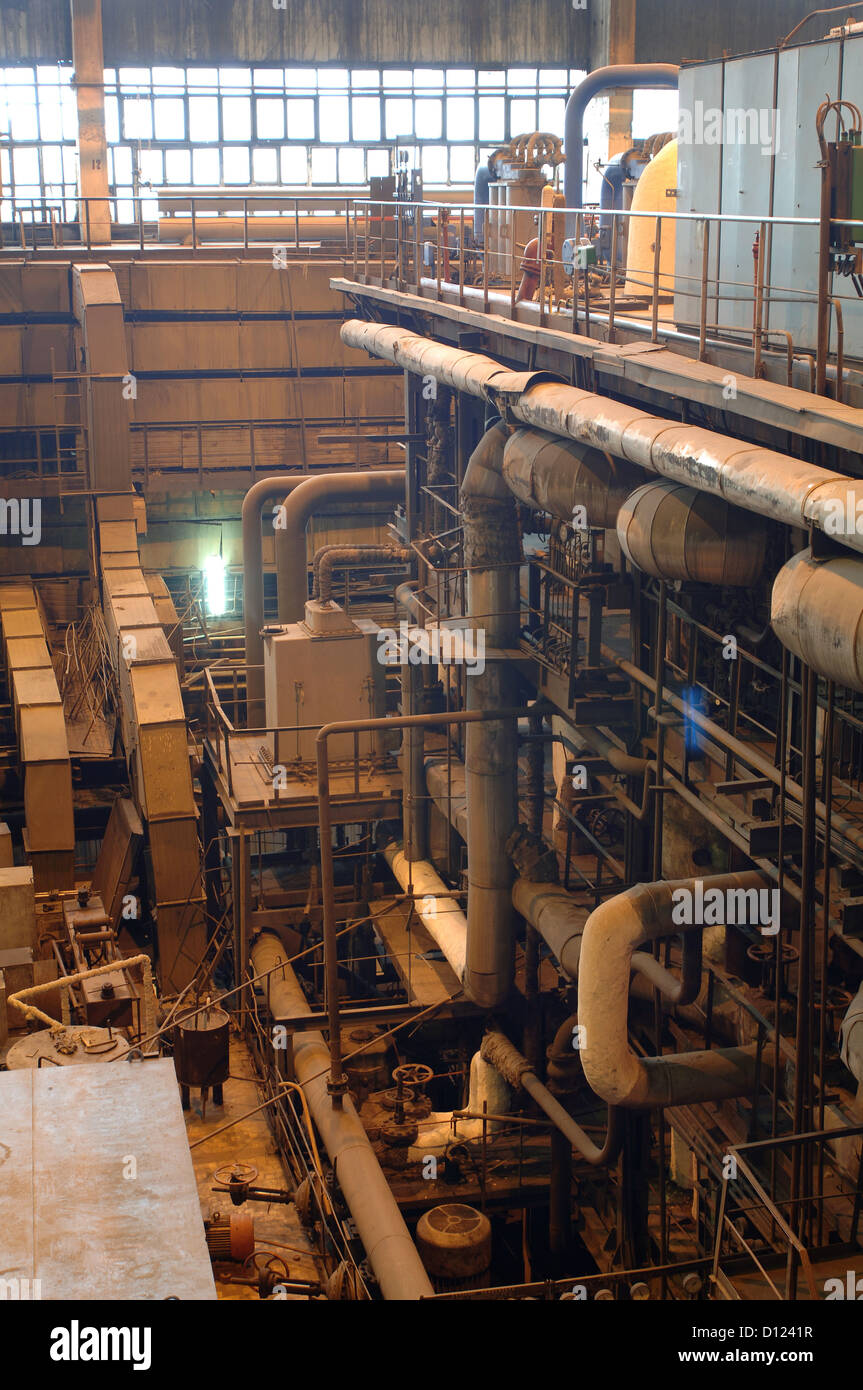 Pipes, tubes, machinery and steam turbine at a power plant Stock Photo ...