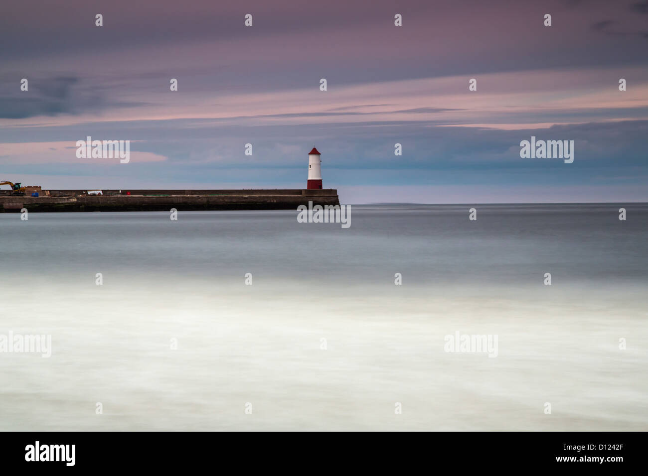 A Lighthouse At The End Of A Pier; Berwick Northumberland England Stock ...
