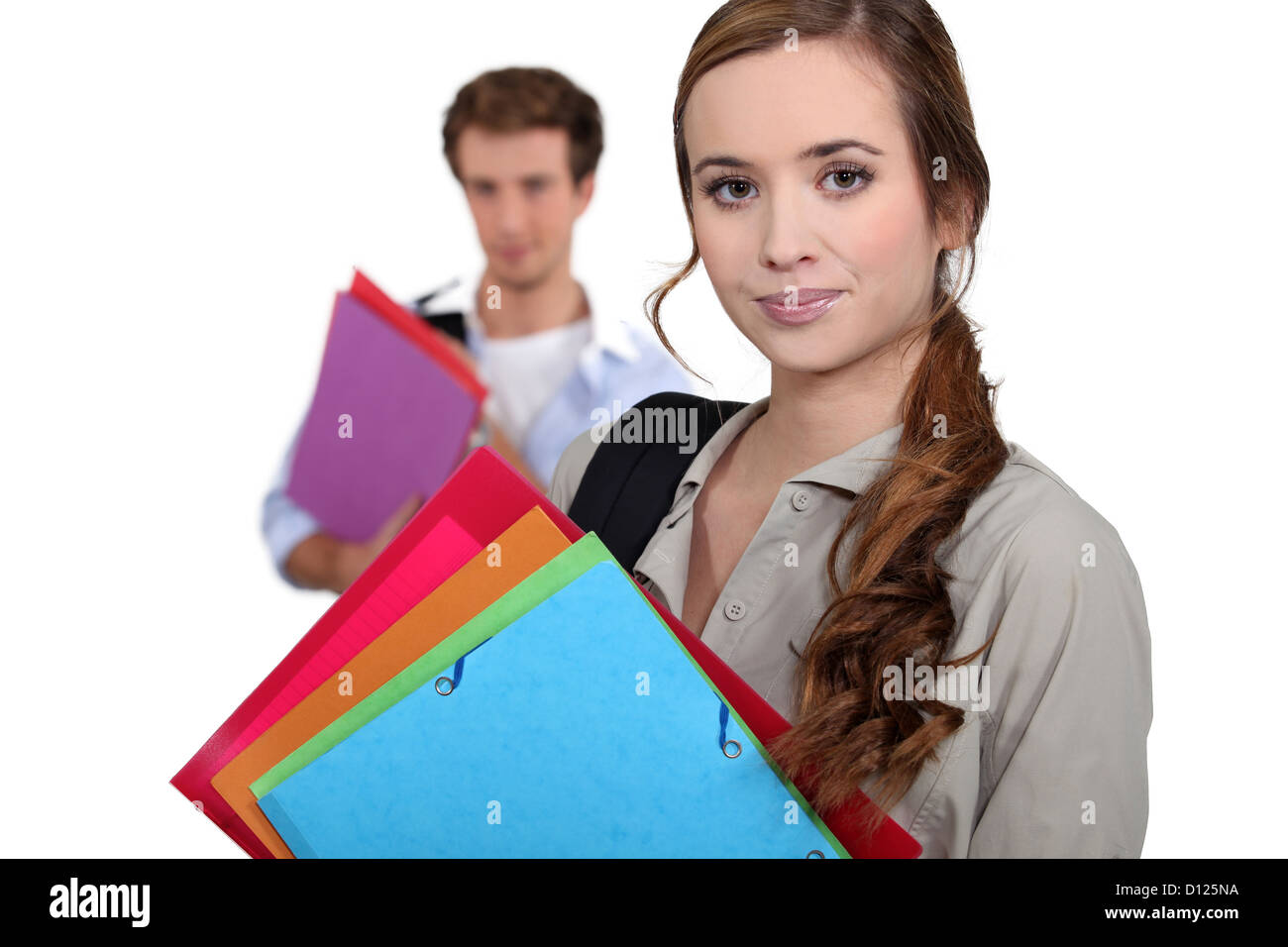 Students carrying folders Stock Photo - Alamy