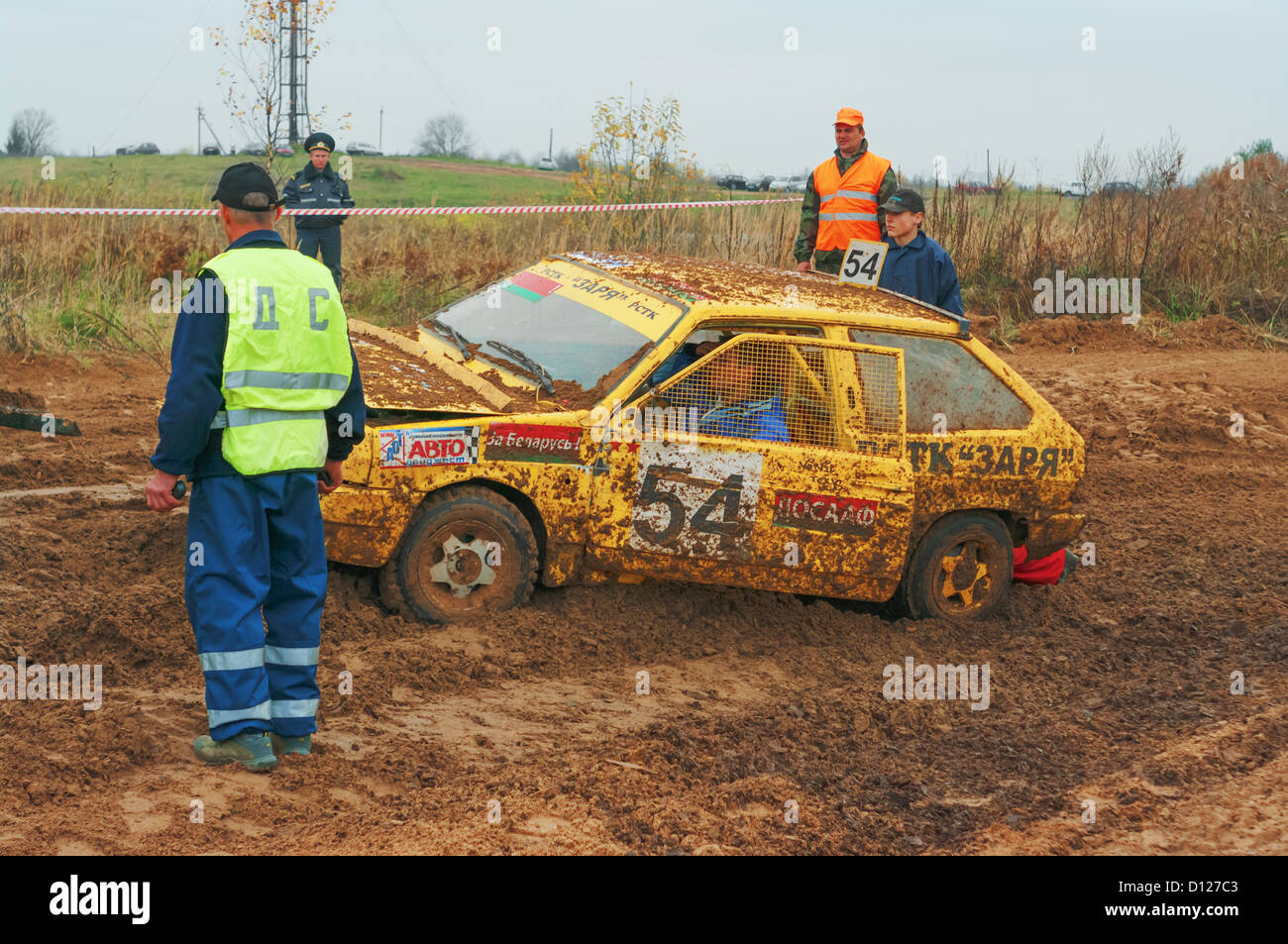 The racing car damaged on dirty road Stock Photo - Alamy