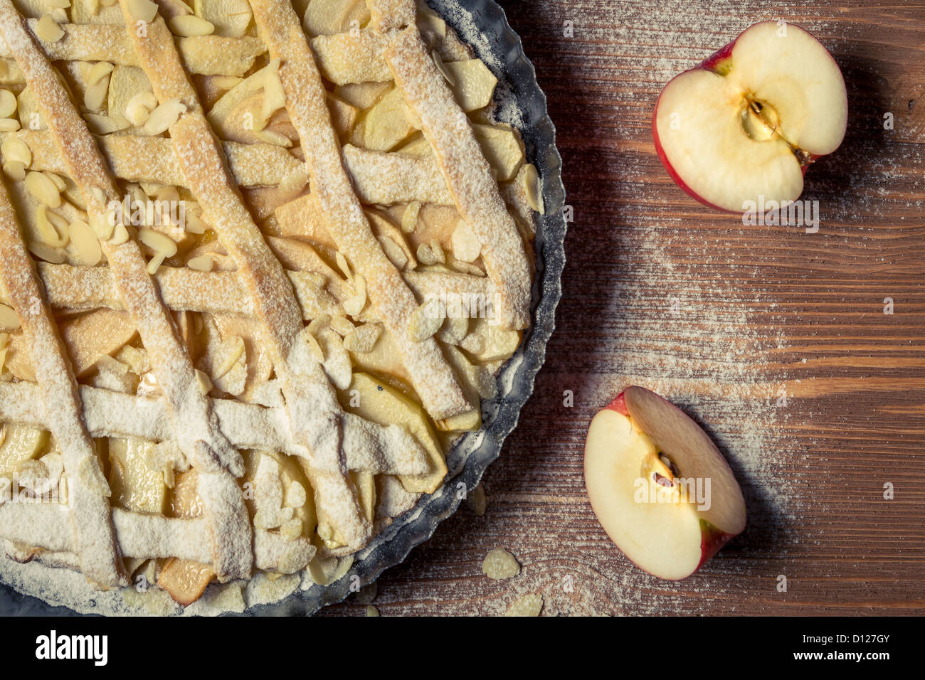 Baked apples and apple cake decorated with icing sugar Stock Photo - Alamy
