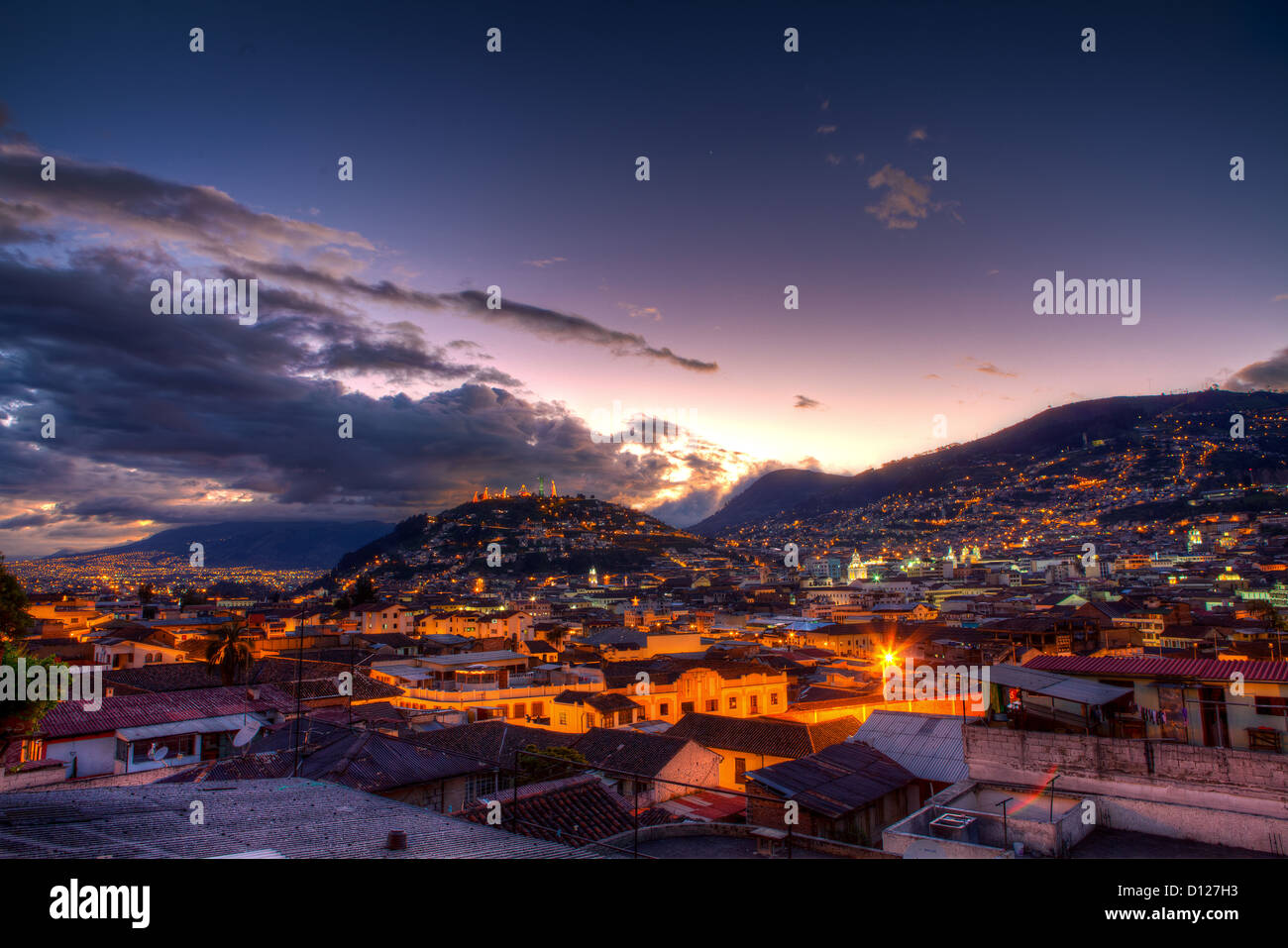 City Lights come on during a beautiful twilight over Quito, Ecuador ...